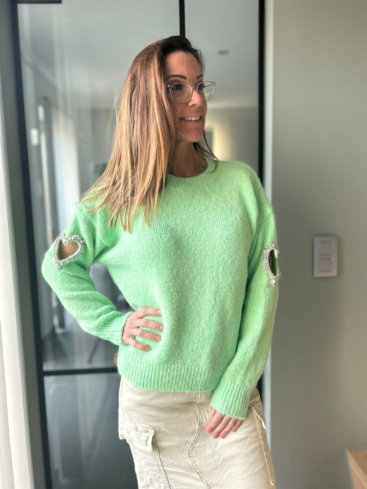 Pull met hartje in fel groen | Diva Fashion